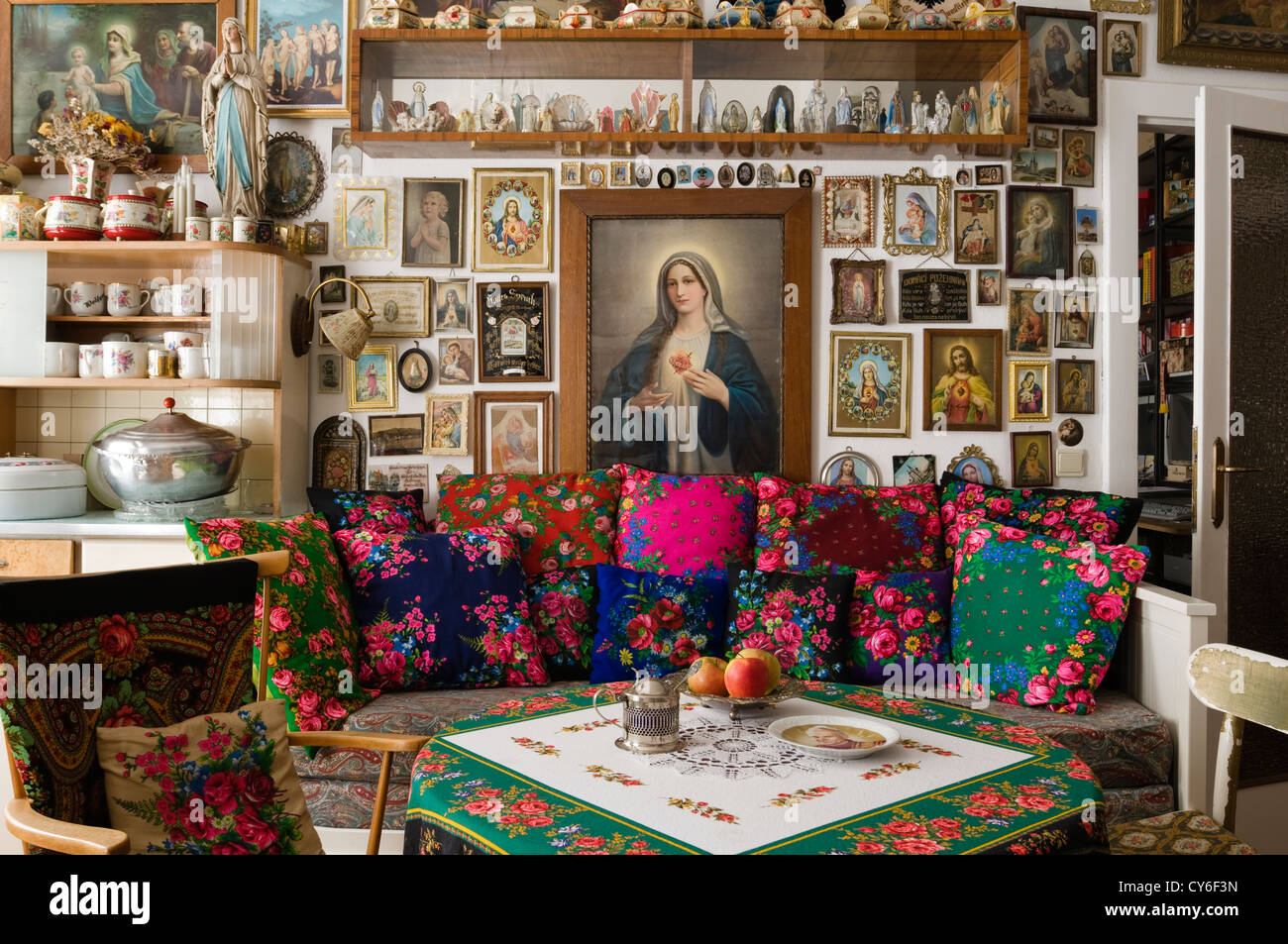 Kitchen furnished with vintage furniture and orthodox Russian ...