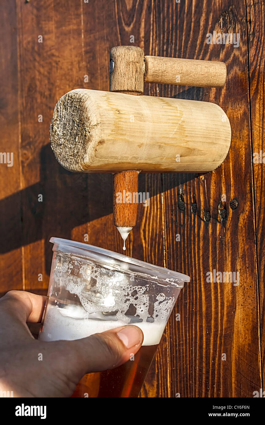 Last drop of beer from a cask Stock Photo - Alamy