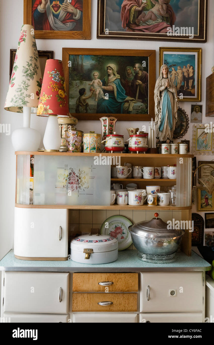 Kitchen furnished with vintage furniture and orthodox Russian ...
