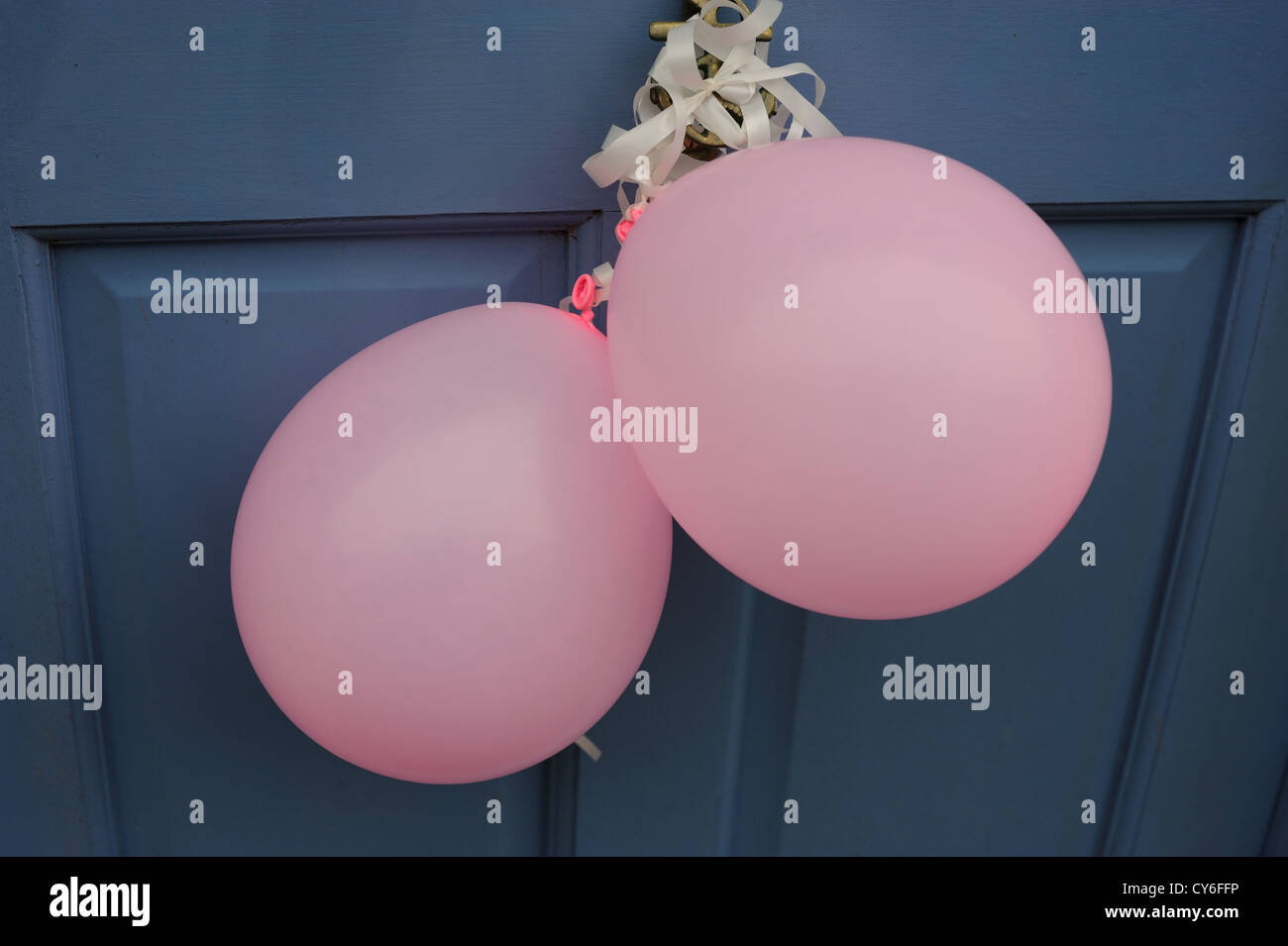 Pink balloons and door hi-res stock photography and images - Alamy