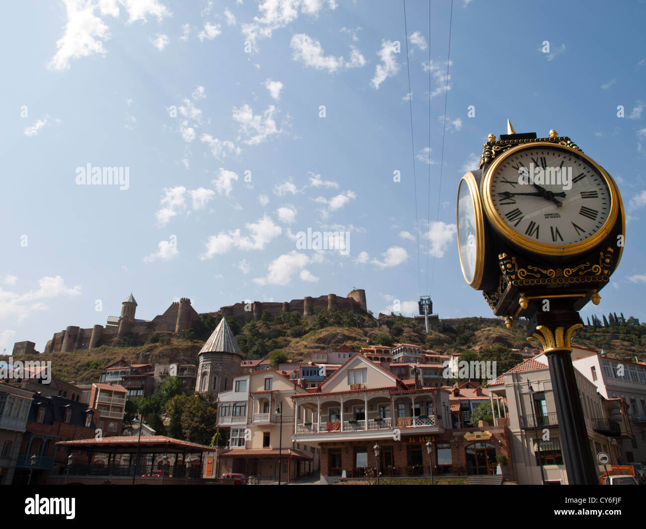 Street clock in Old Tbilisi Stock Photo - Alamy