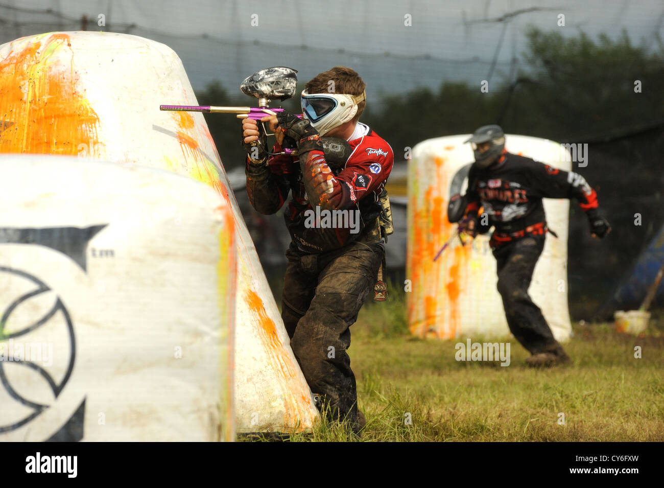 Two paint ball players Stock Photo - Alamy