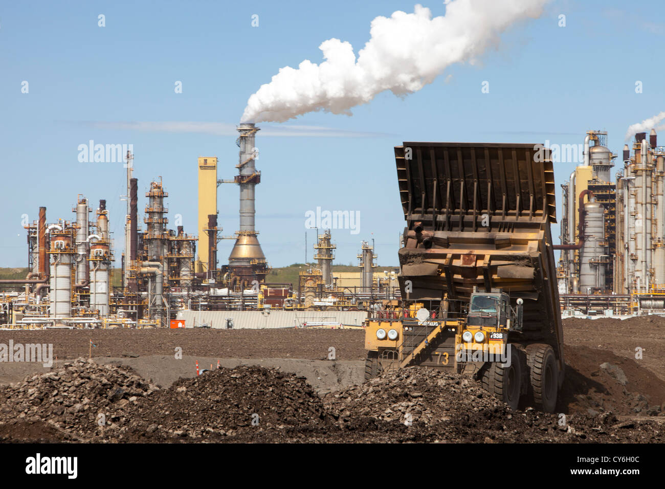 Massive dump trucks by the Syncrude upgrader plant. The tar sands are ...