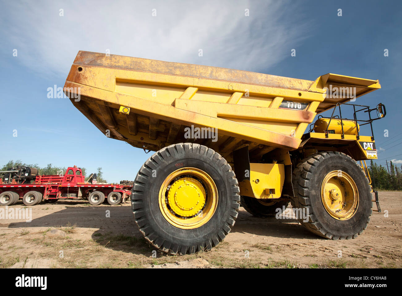 Massive dump trucks by the Syncrude upgrader plant. The tar sands are ...