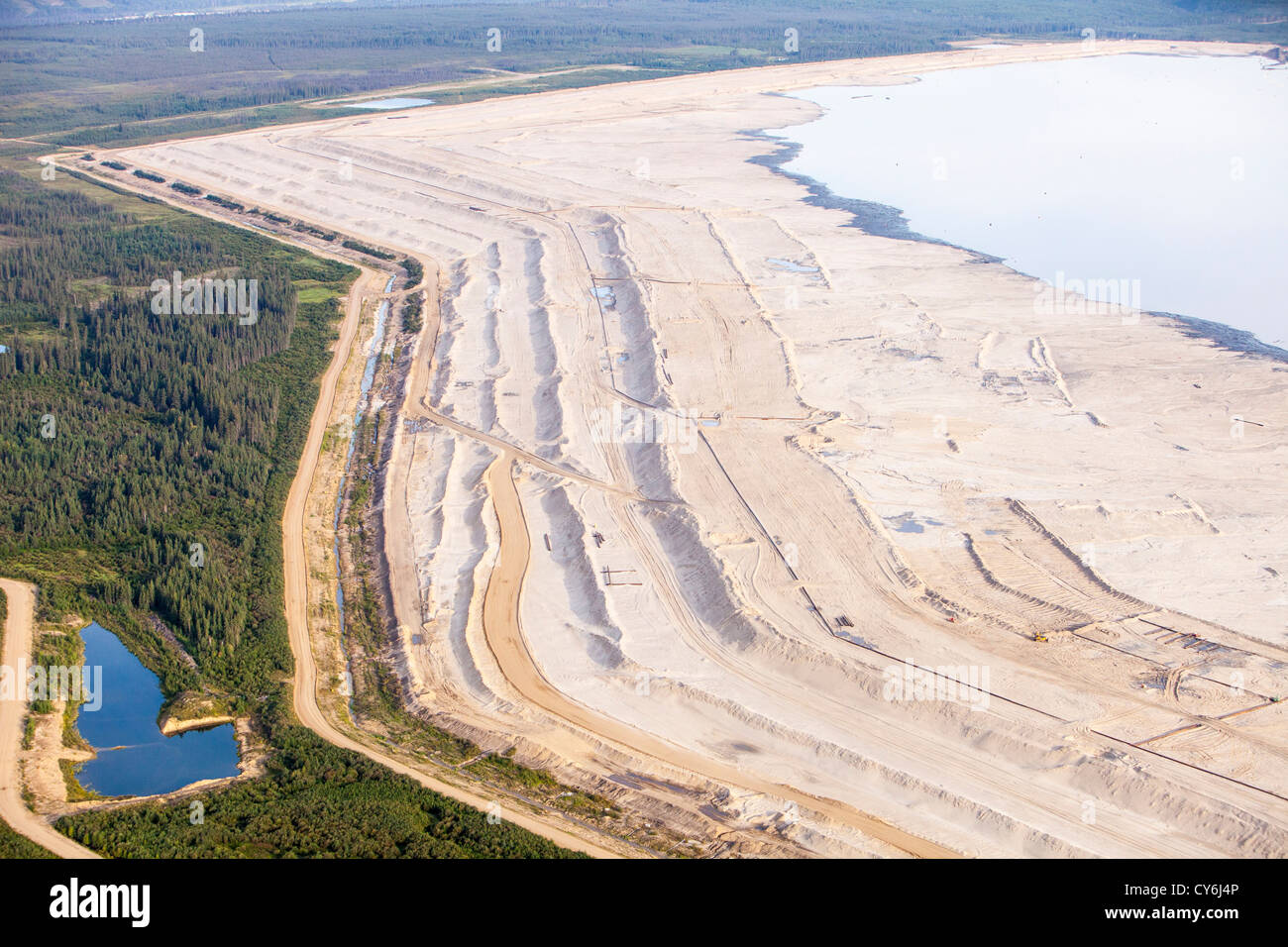 The tailings pond at a mine north of Fort McMurray, Alberta, Canada ...