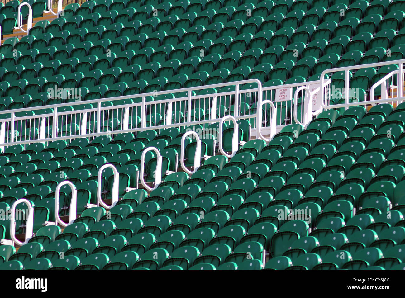 Terrace seating in outdoor stadium or arena with green theme Stock ...
