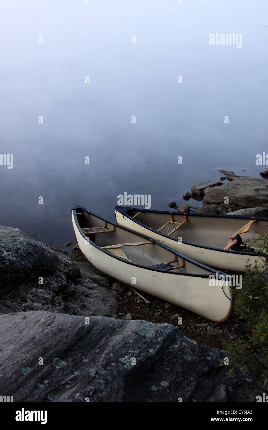 Canoe fog lake mist hi-res stock photography and images - Alamy