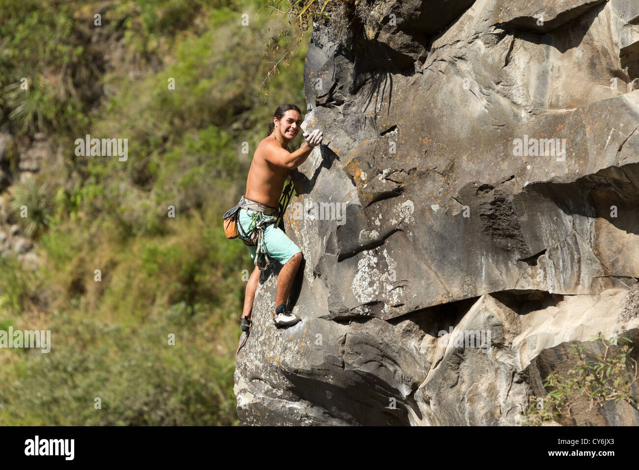 Rock Climber Climb Up A Cliff Stock Photo - Alamy