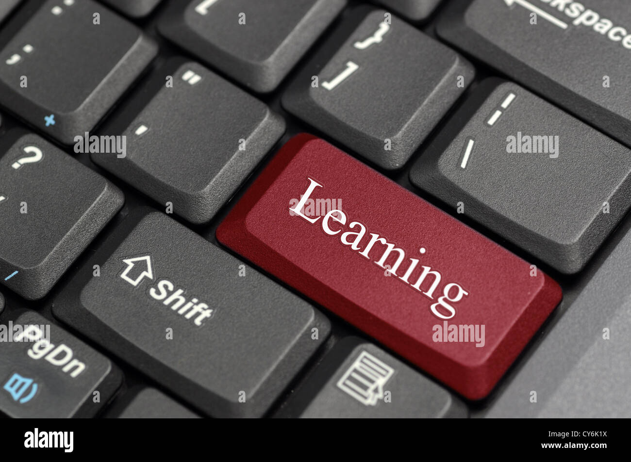 Learning on keyboard Stock Photo - Alamy