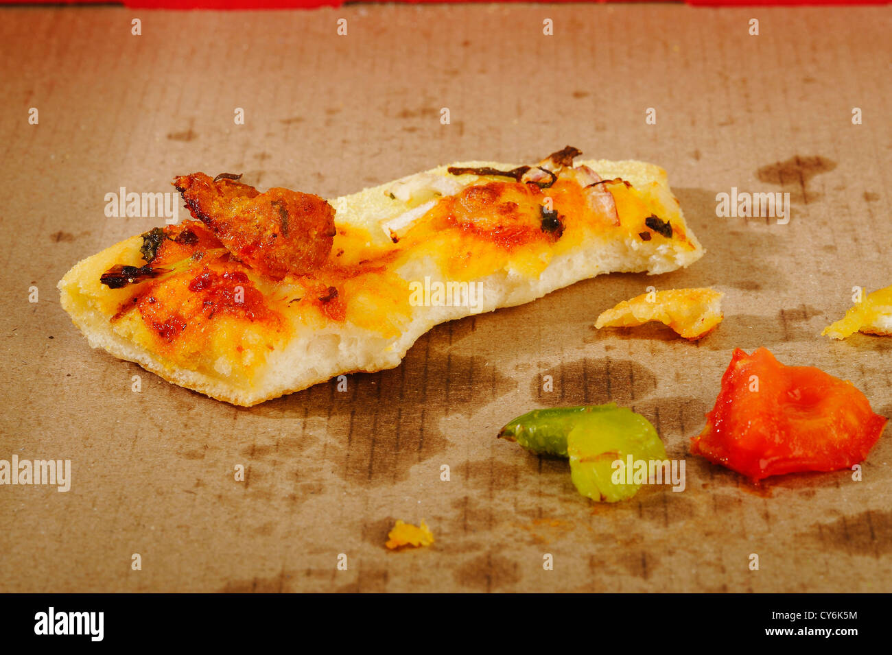 empty pizza box with one scrap of a piece remains Stock Photo - Alamy