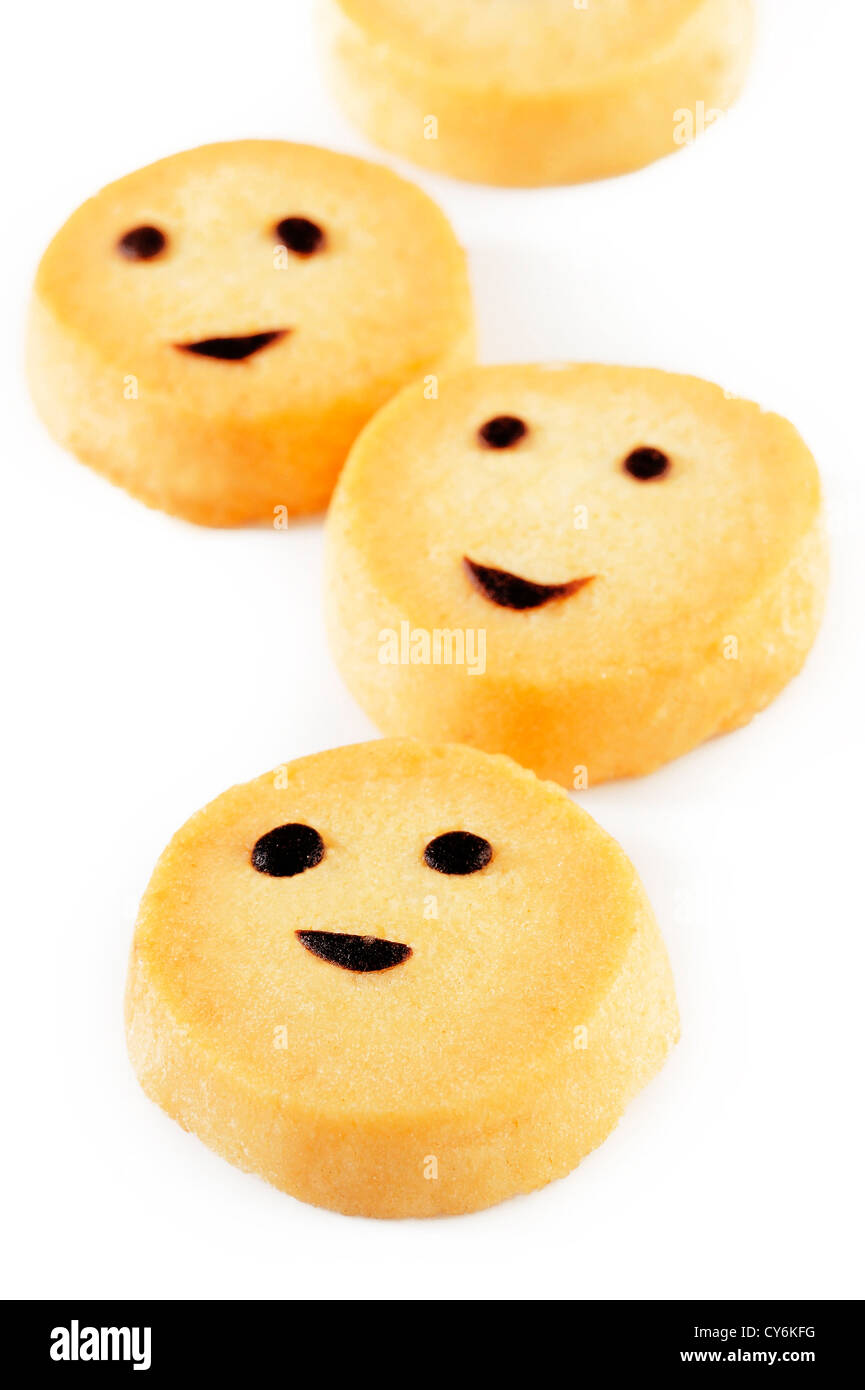 happy cookies on white background Stock Photo - Alamy