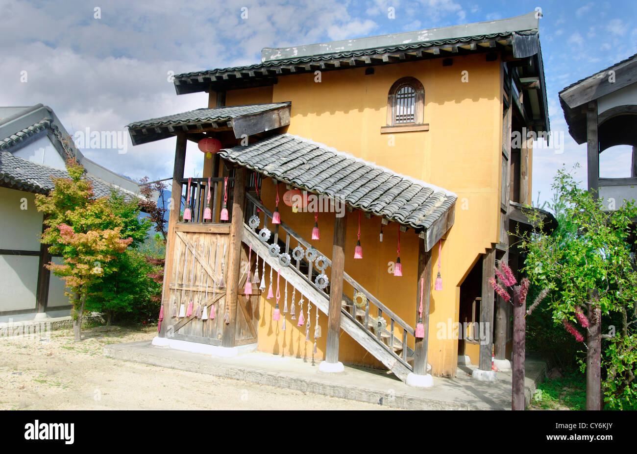 Traditional Chinese two-story house on a background of blue sky Stock ...