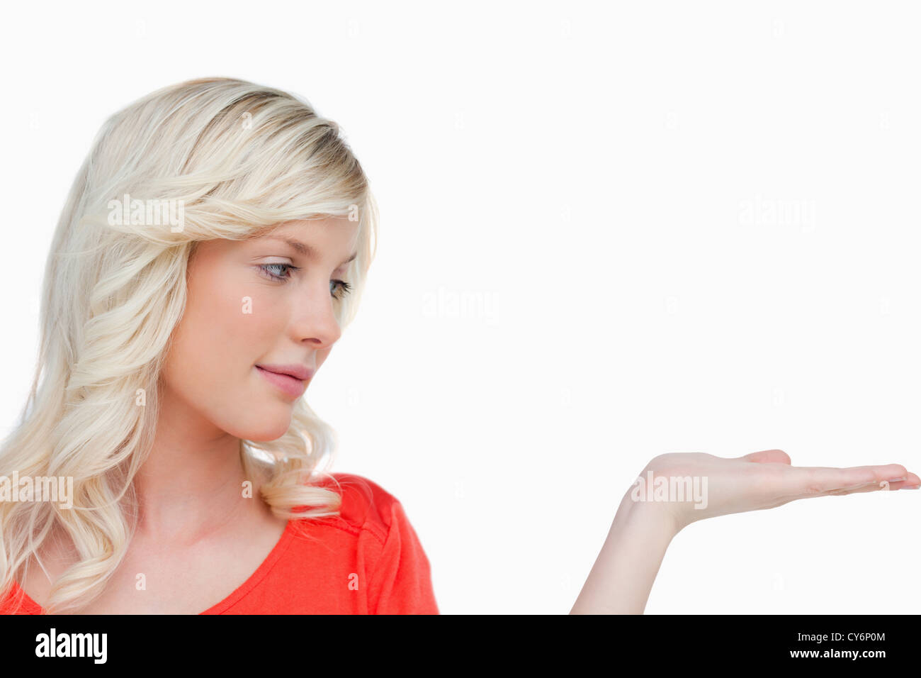 Beautiful woman placing her hand palm up Stock Photo - Alamy