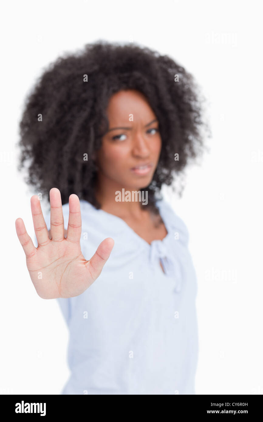 Young angry woman making the hand stop sign Stock Photo - Alamy