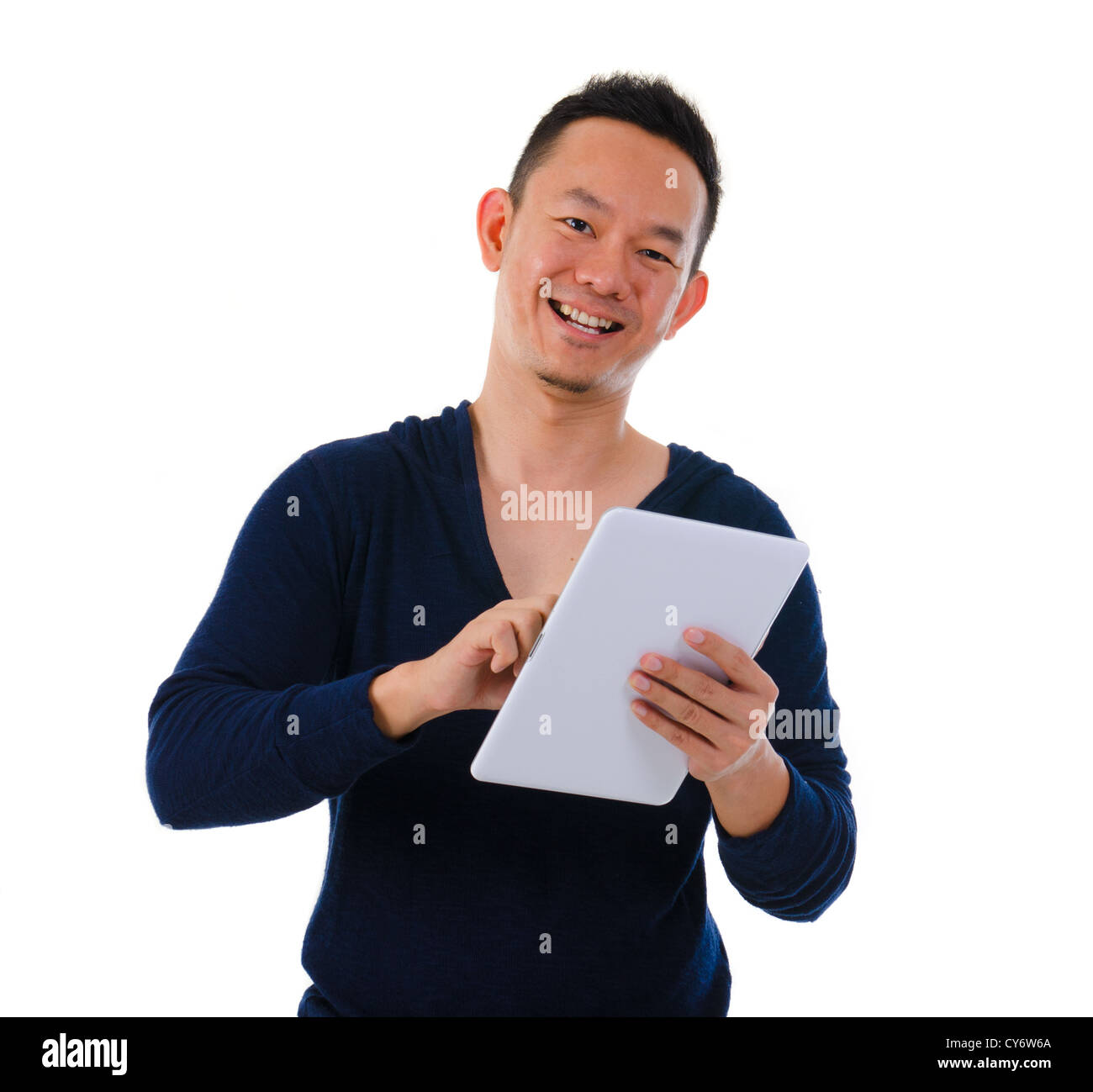 happy asian male on a generic tablet Stock Photo - Alamy