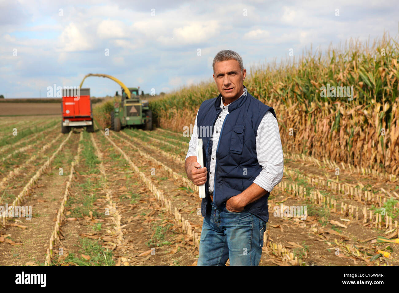 Farmer posing in his field Stock Photo - Alamy