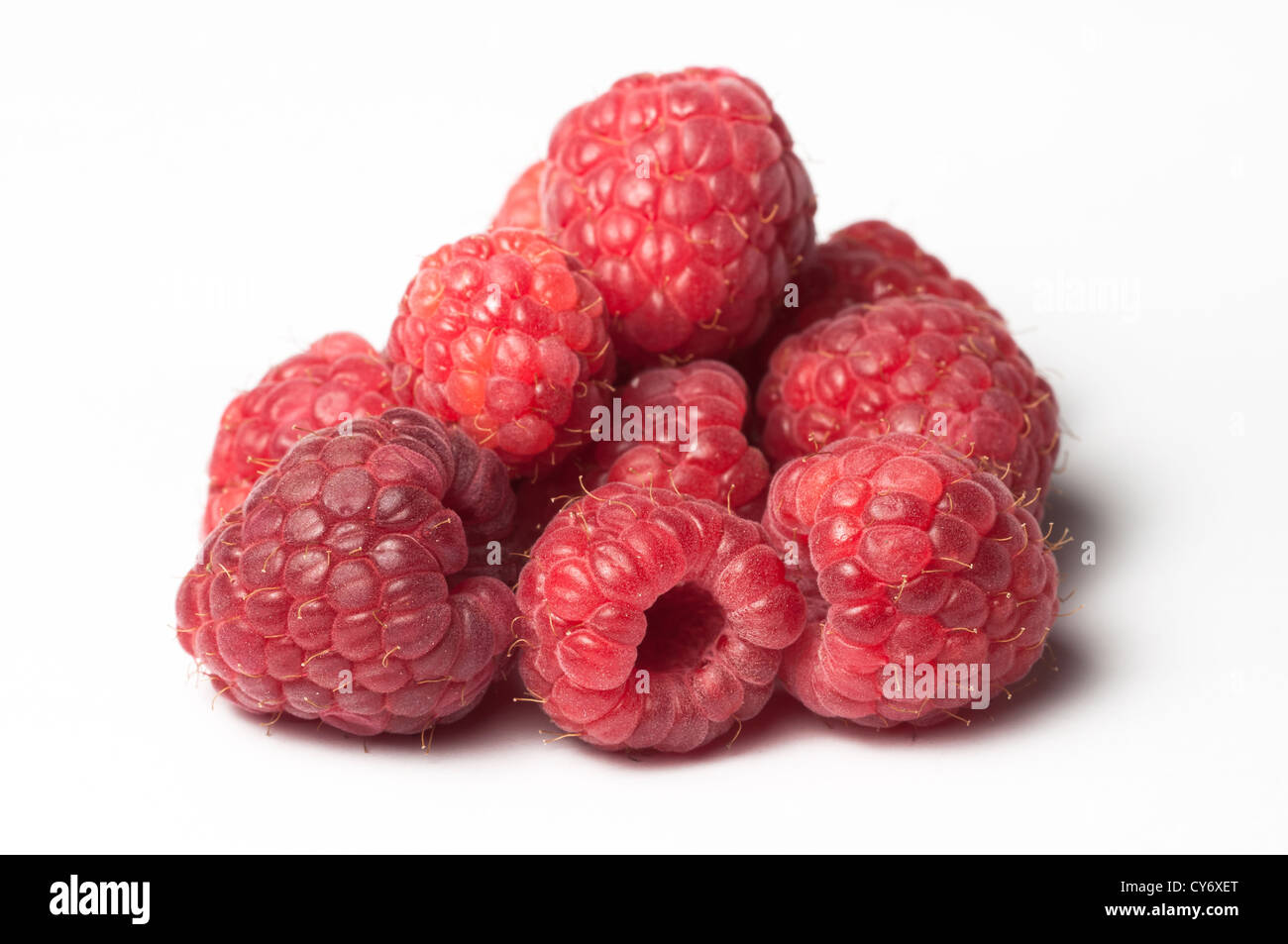 Raspberries isolated on a white background Stock Photo - Alamy