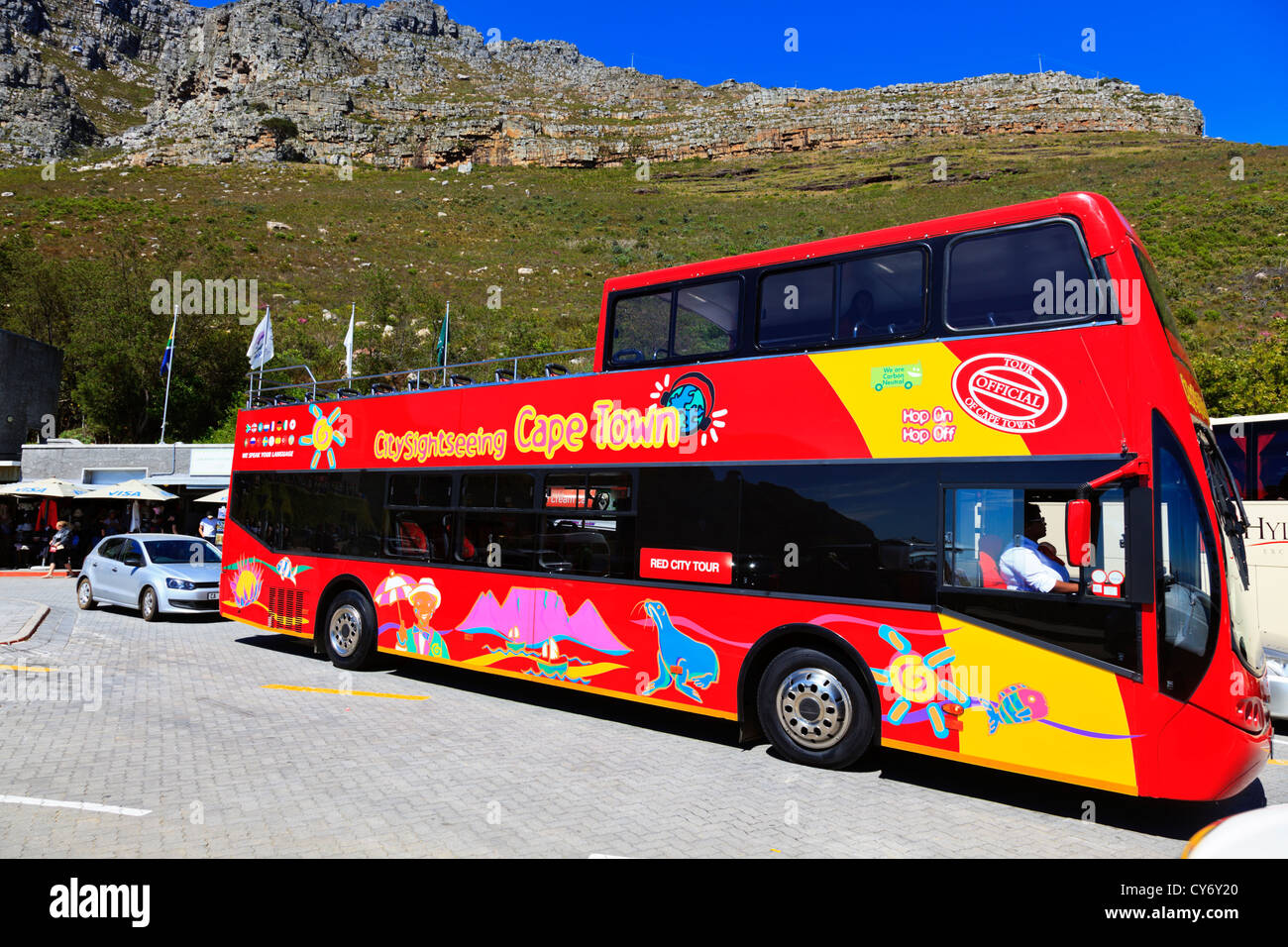 Cape Town, South Africa. A Cape Tours sightseeing bus leaving Cape ...
