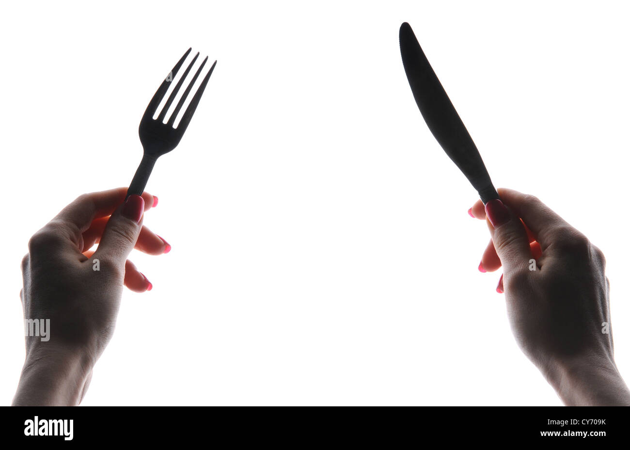 hands with knife and fork Stock Photo - Alamy