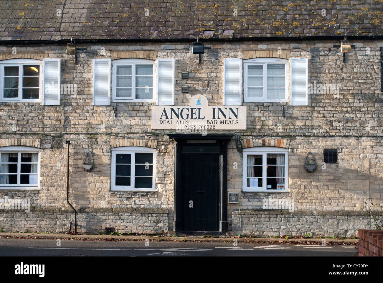 Angel Inn stone built old village pub Stock Photo - Alamy
