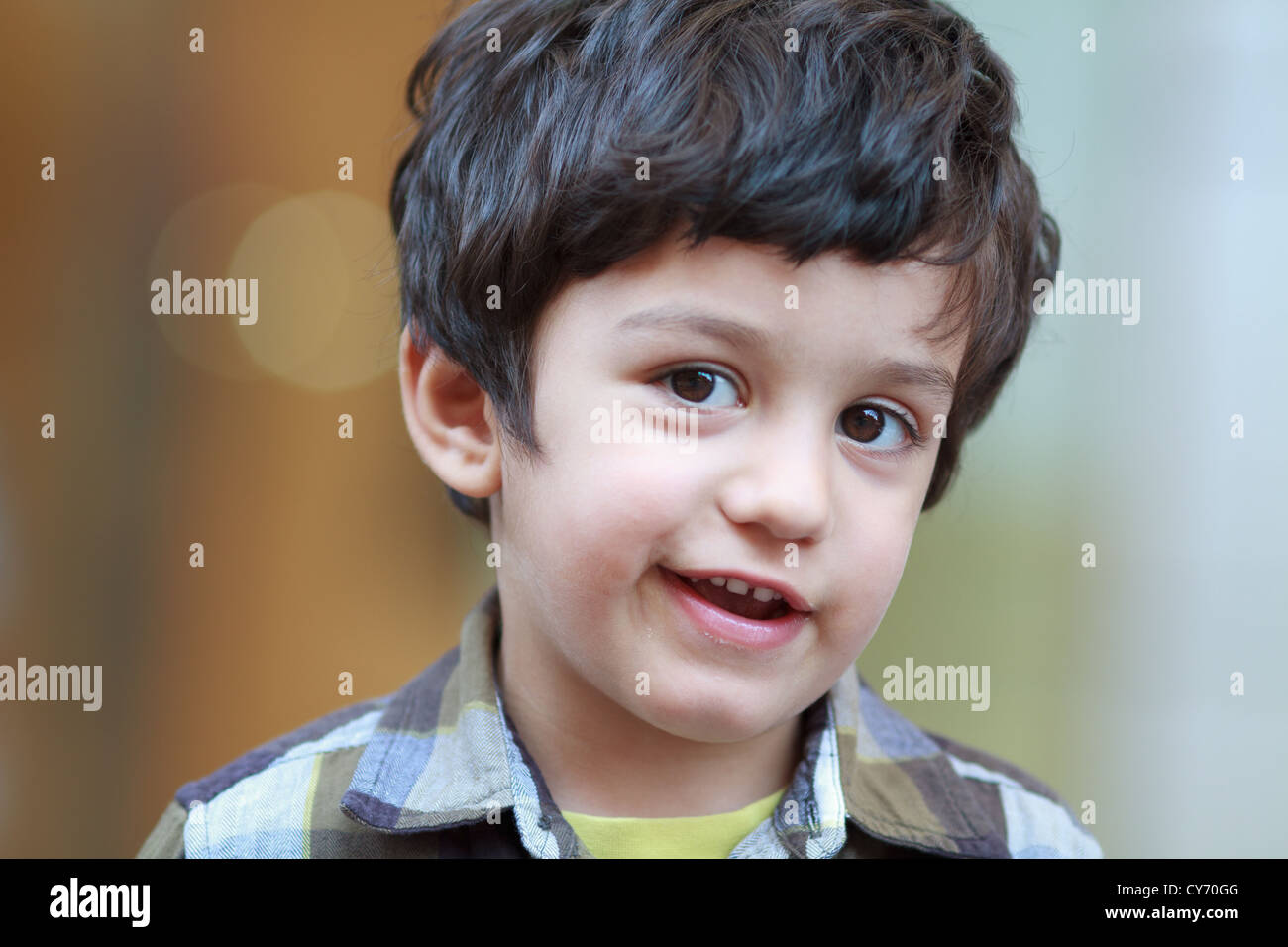 Smiling boy looking at camera Stock Photo - Alamy