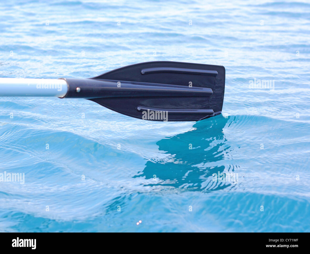 Paddle boat on background of sea water Stock Photo - Alamy