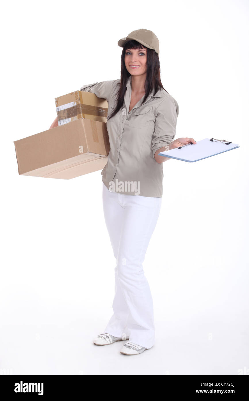 Delivery woman with packages Stock Photo - Alamy