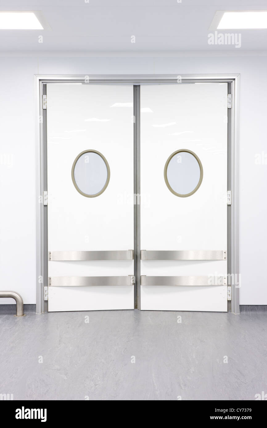 White modern contemporary factory swing doors, clean, crisp Stock Photo ...