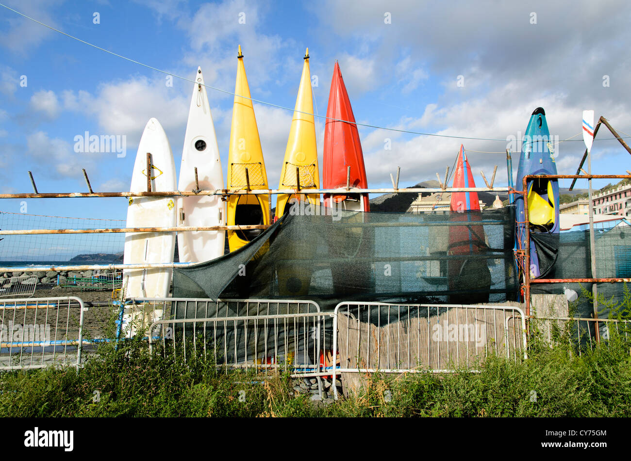 Canoes in the beach of Voltri - Genoa, Italy Stock Photo - Alamy