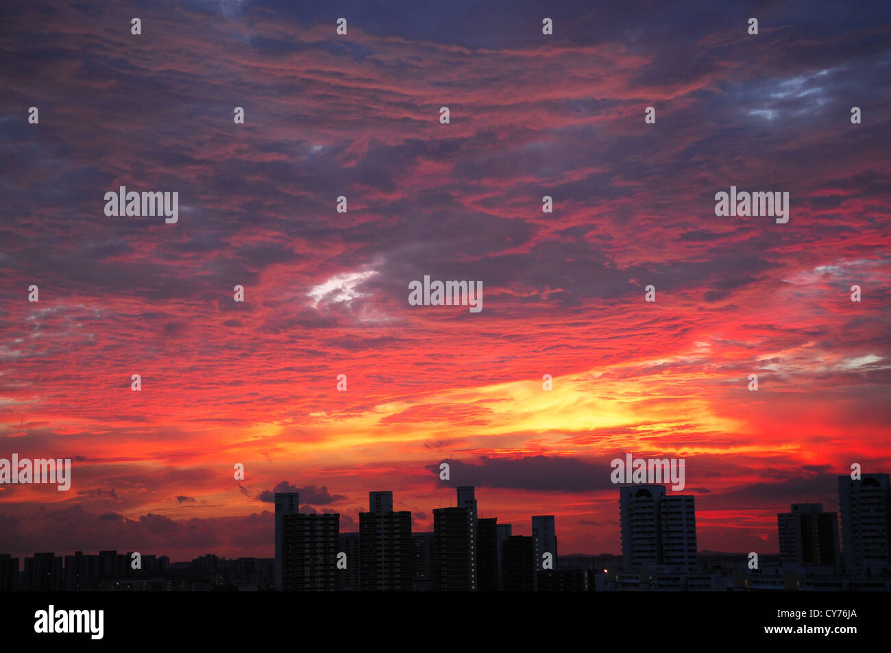 red clouds sunset over the city Stock Photo - Alamy