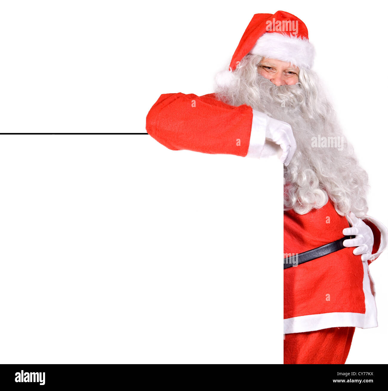 Santa Claus holding a blank sign Stock Photo - Alamy
