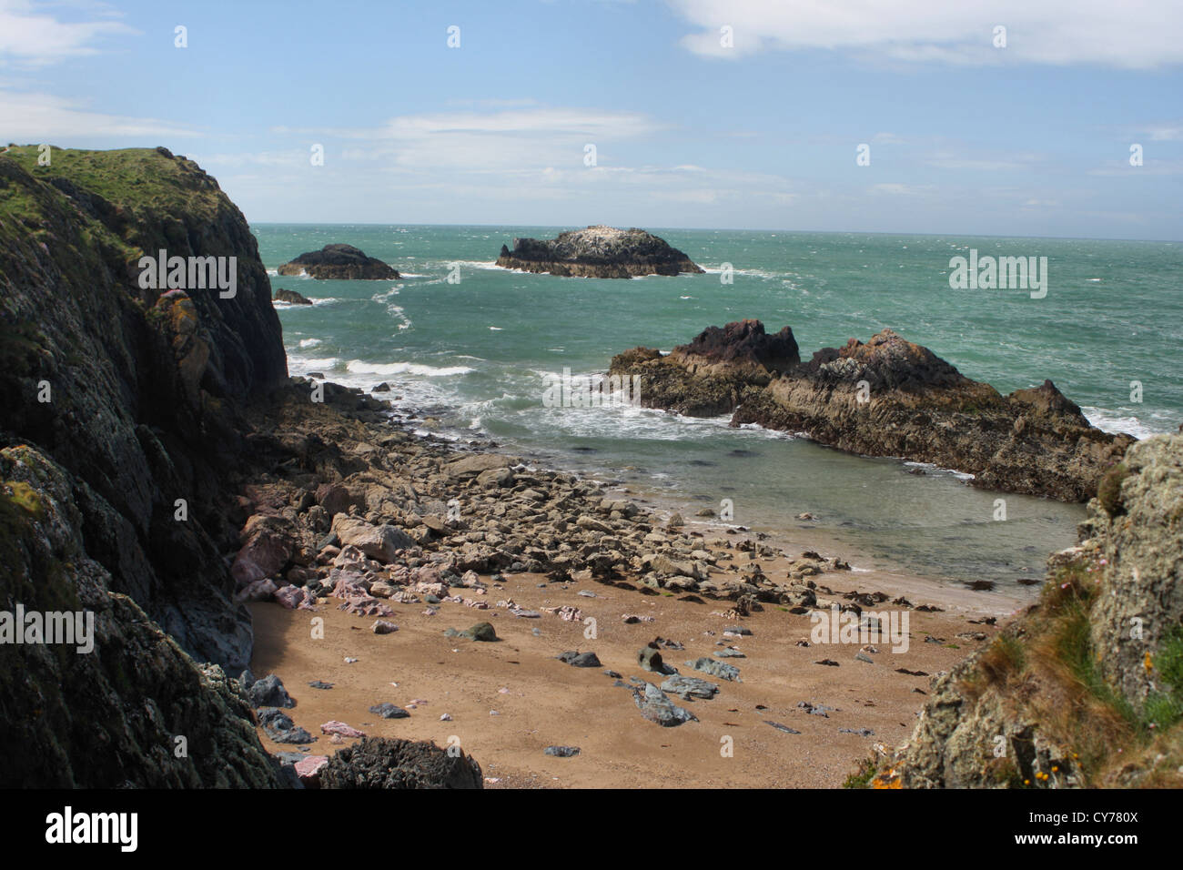 Llanddwyn Island coastal rocks and Ynys Yr Adar Anglesey Stock Photo ...