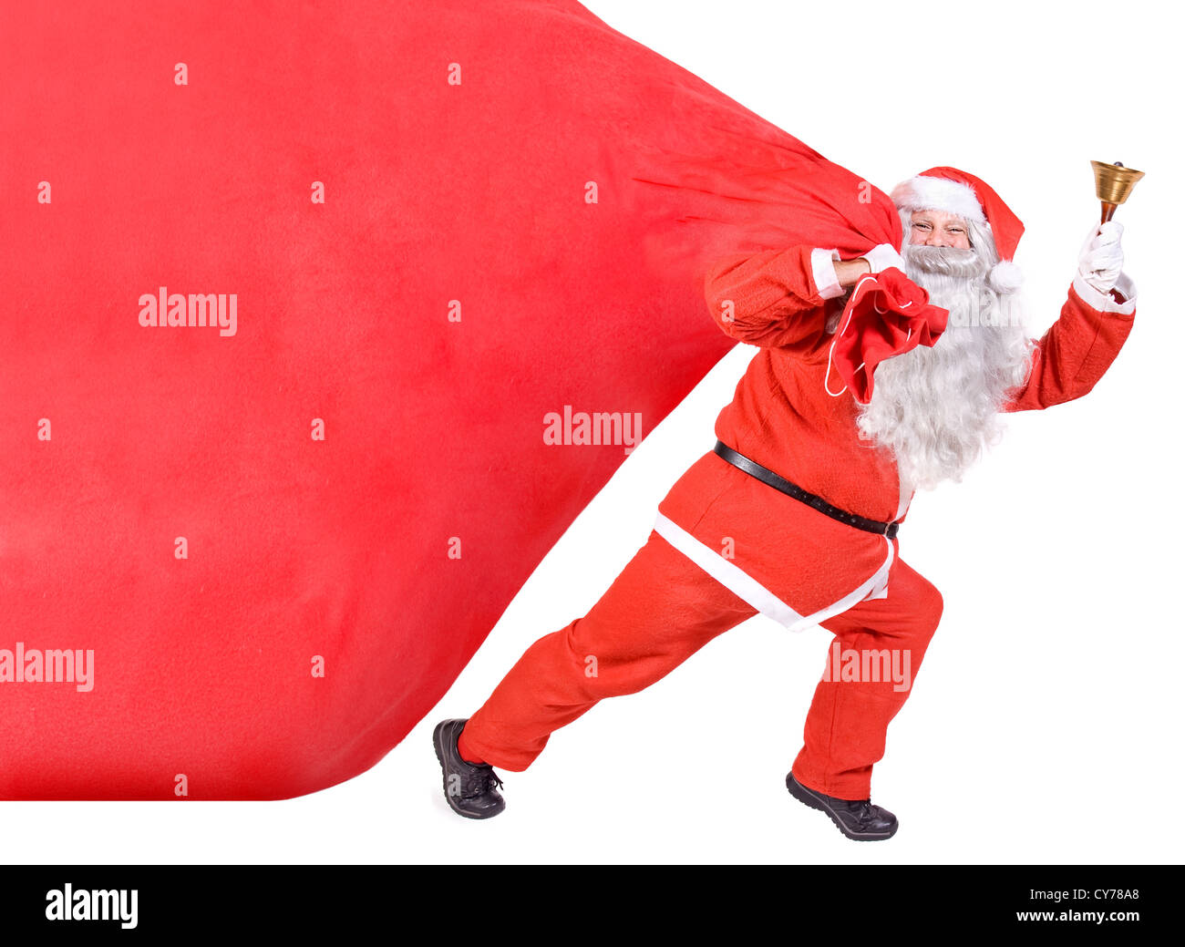Santa Claus pulls a big heavy bag on white background Stock Photo - Alamy