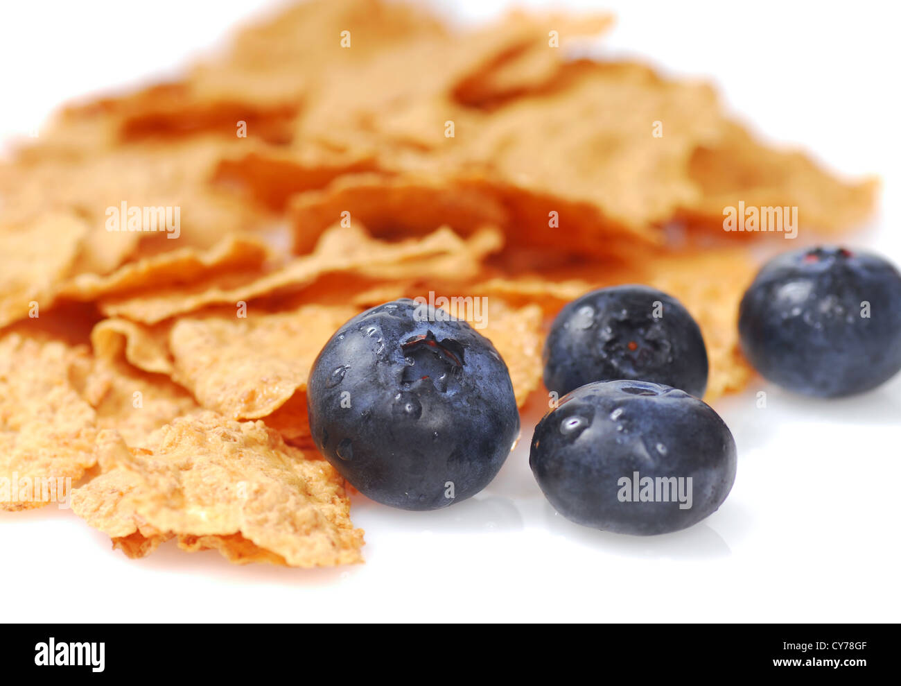 Crunchy bran cereal with fresh organic blueberries Stock Photo - Alamy