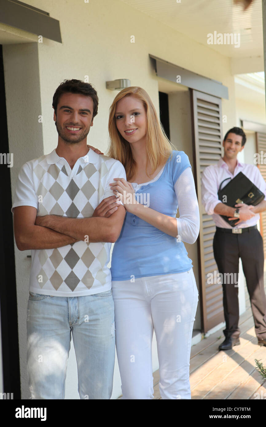 Couple deciding to buy house Stock Photo - Alamy