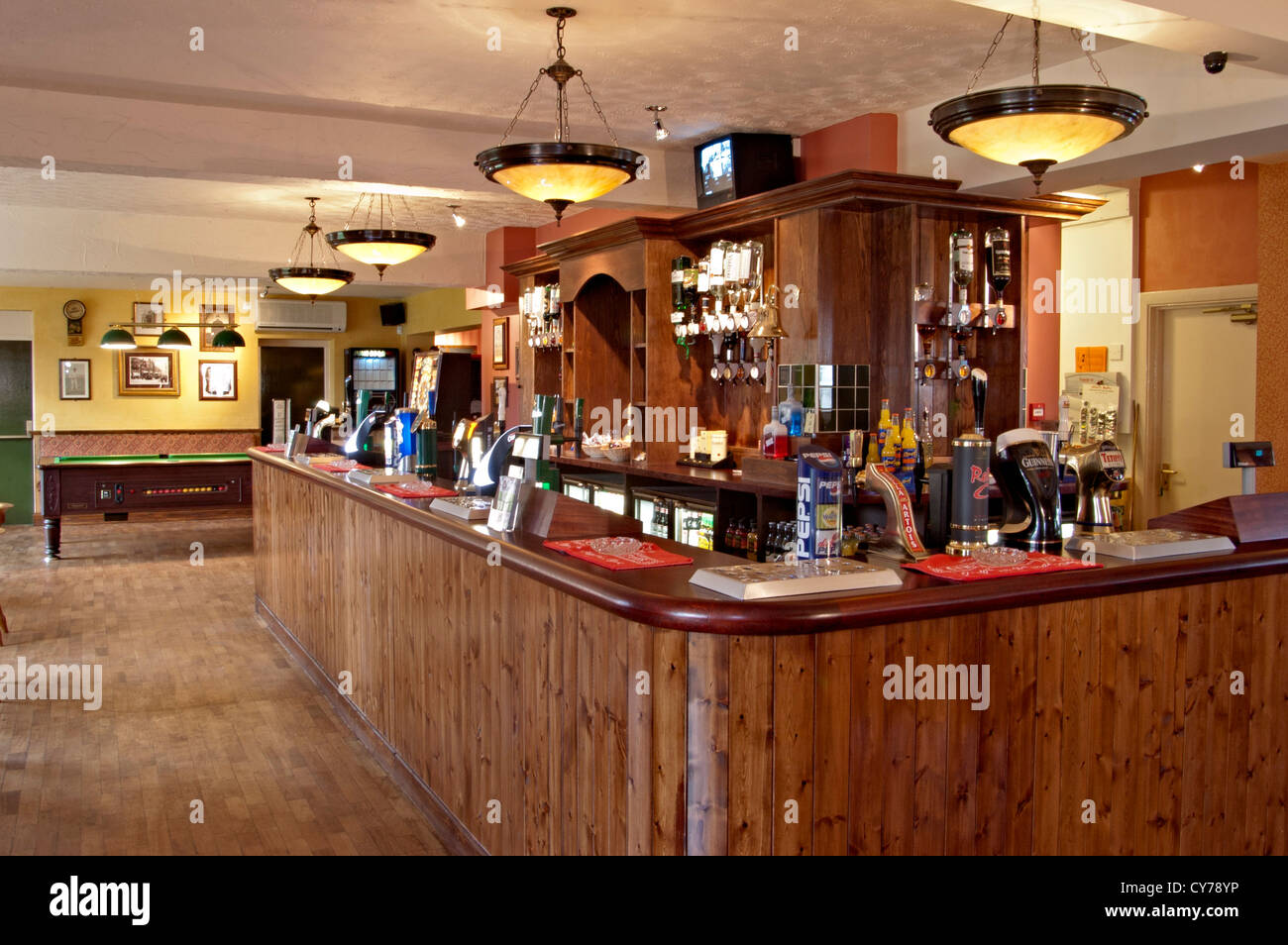 the two triangles bar with ale Beer pumps at the bar Stock Photo - Alamy