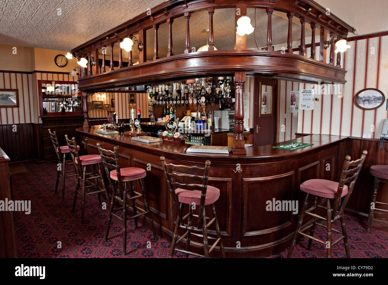 the bush pub beer bar pumps and stools Stock Photo - Alamy
