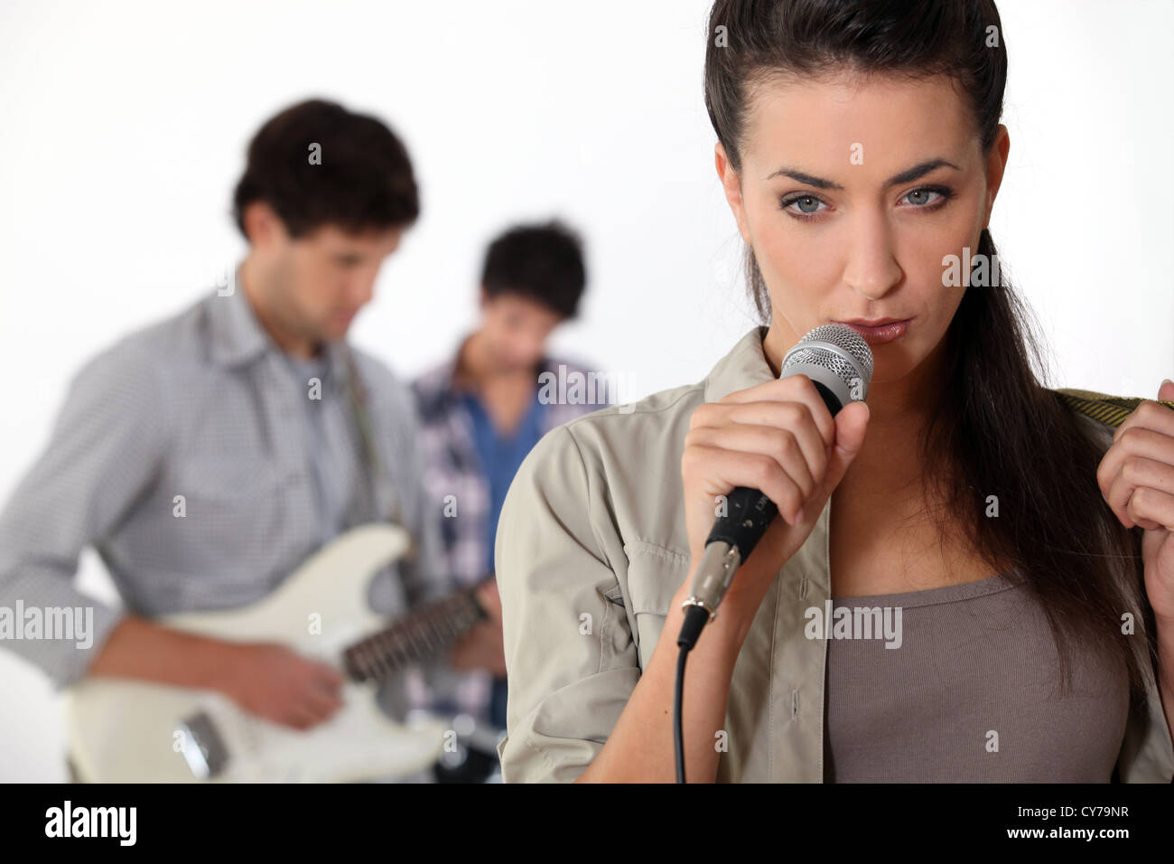 Trio of musicians Stock Photo - Alamy
