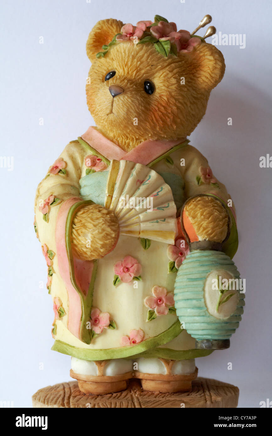 Ornamental teddy bear dressed up in Japanese Kimono and sash carrying ...