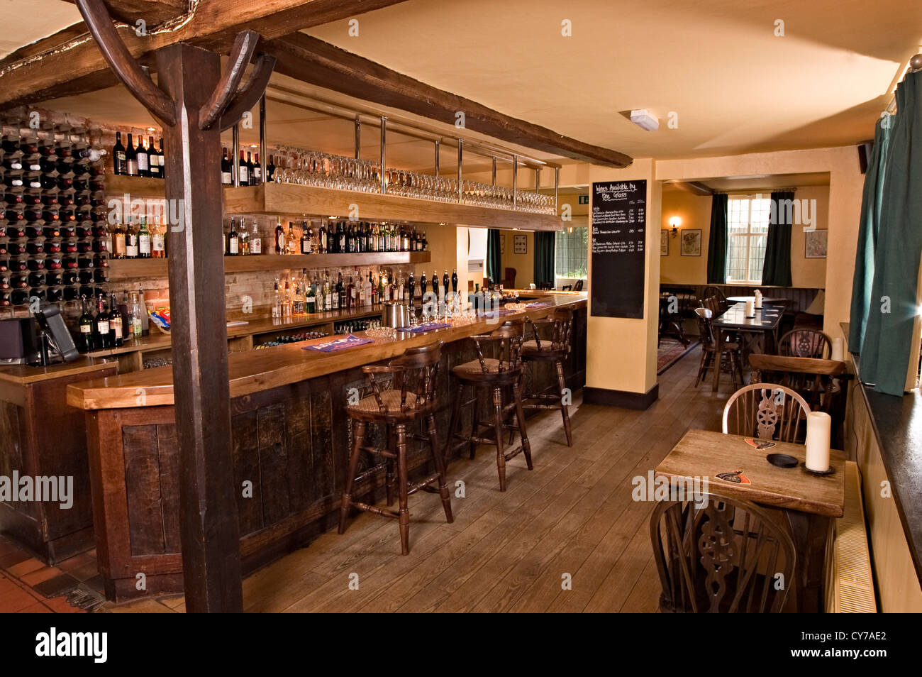 the Harcourt pub bar and beer pumps and stools Stock Photo - Alamy