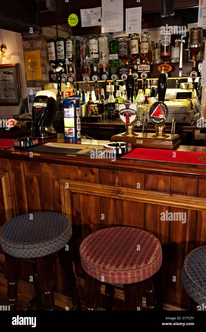 a bar and beer pumps at the sunriser pub Stock Photo - Alamy