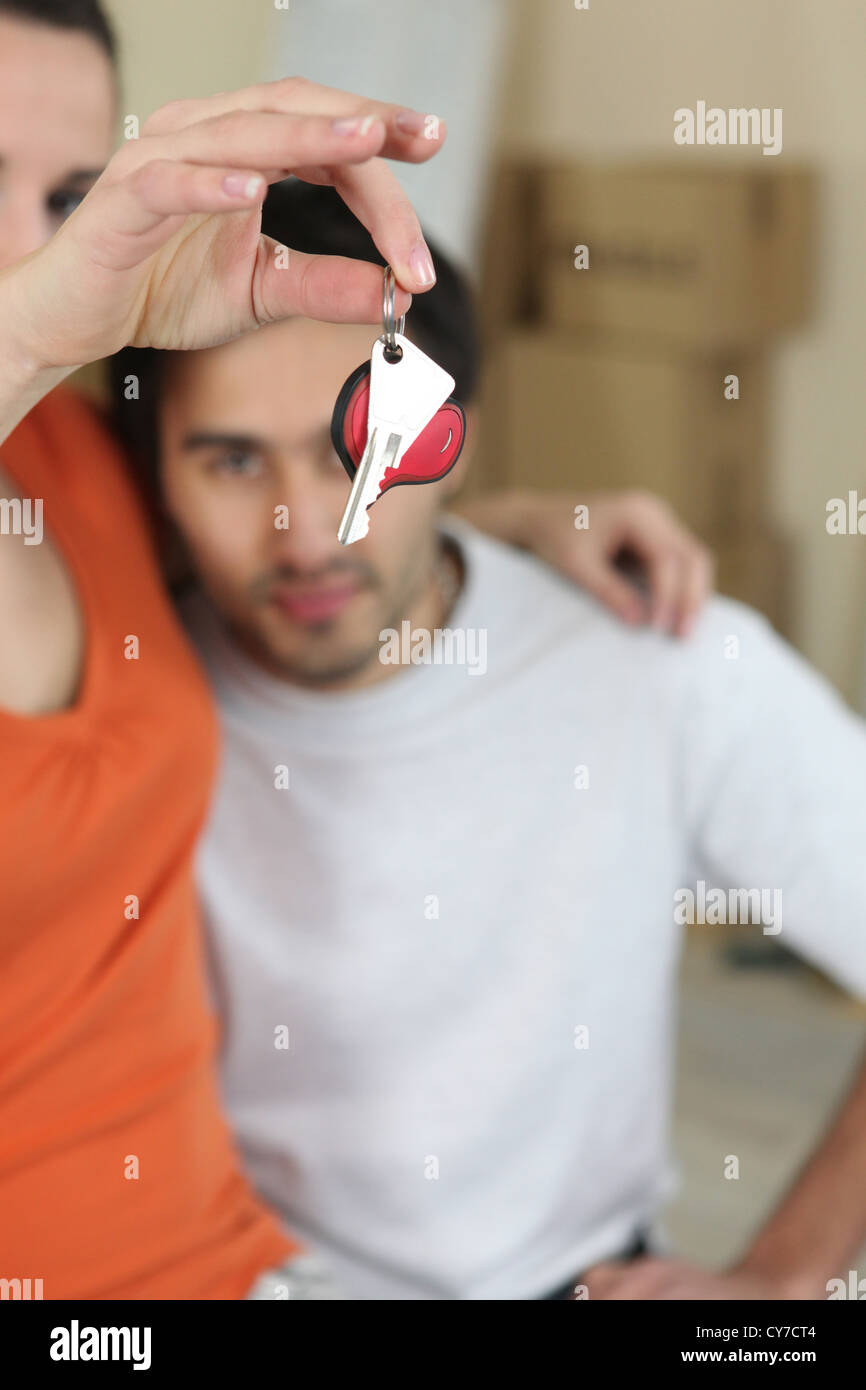 Woman dangling keys Stock Photo - Alamy