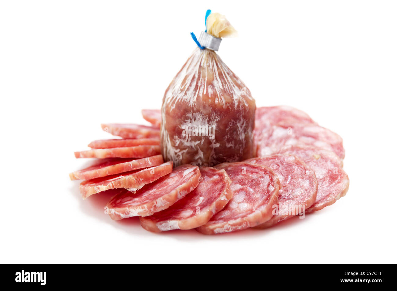dried sliced salami isolated on white background Stock Photo - Alamy
