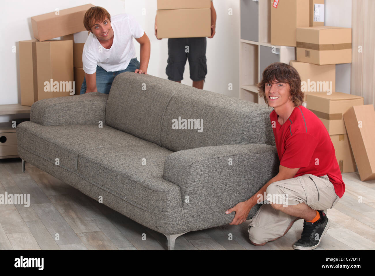 Men moving into new house Stock Photo - Alamy