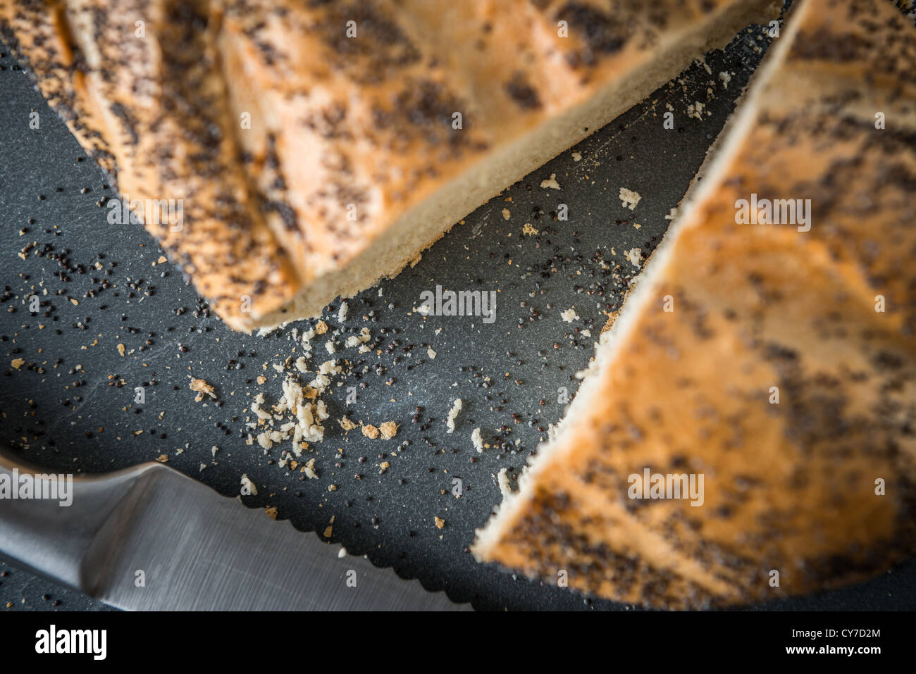 Cut loaf of bread on slate surface Stock Photo - Alamy