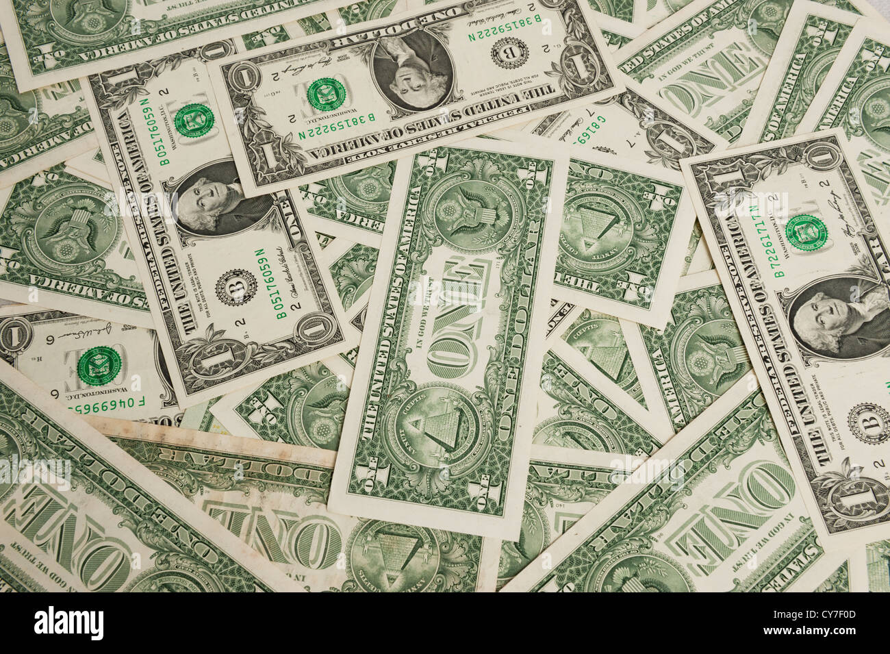 Group of one dollar bills background Stock Photo - Alamy