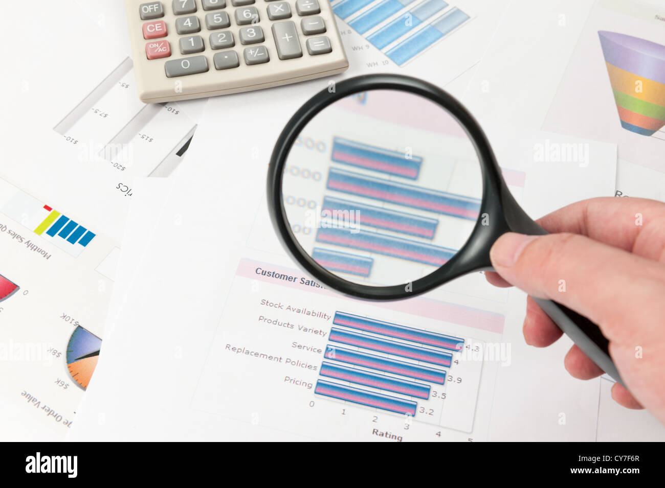Magnifier and graph hi-res stock photography and images - Alamy