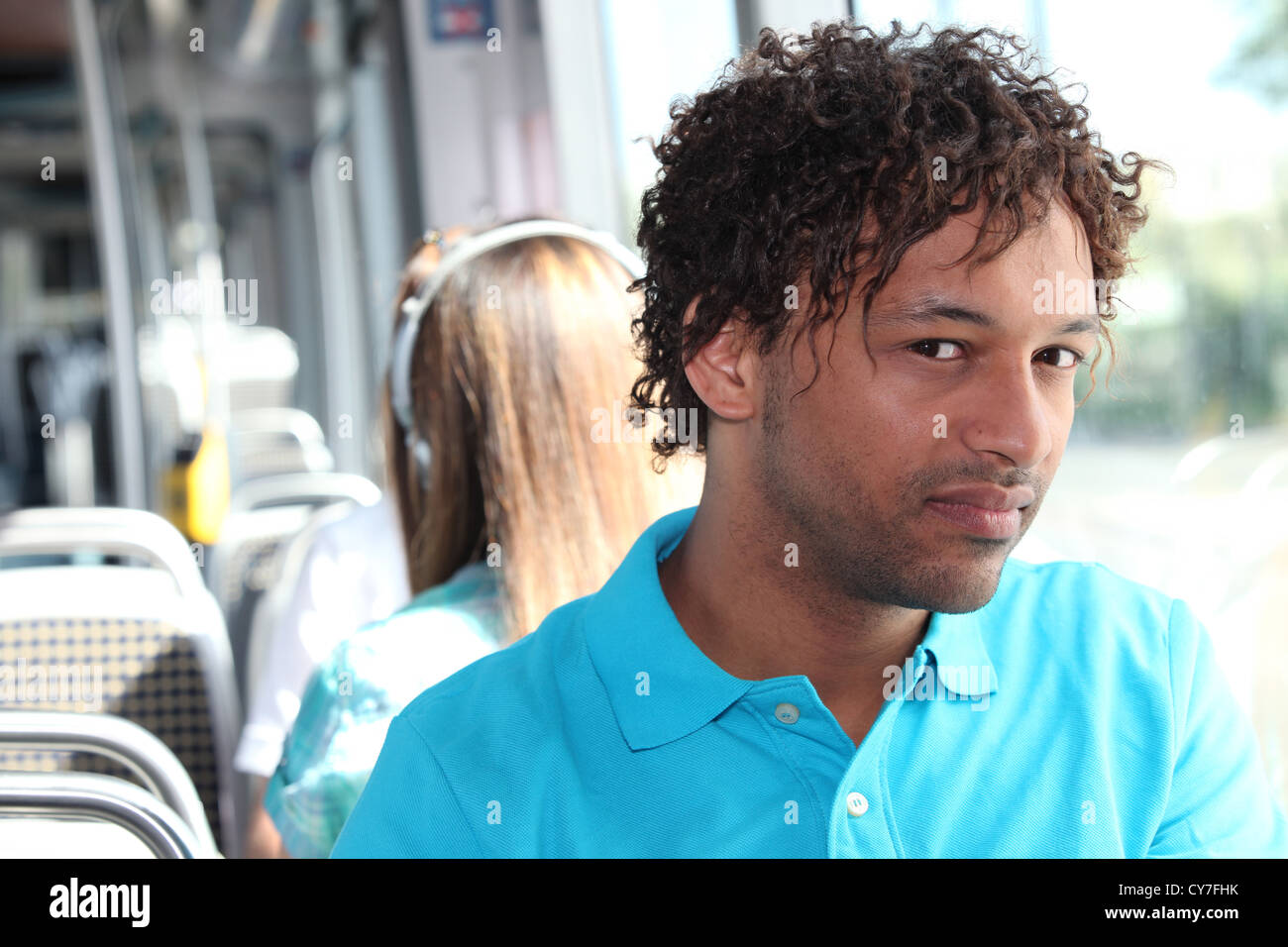 Man sitting on the bus Stock Photo - Alamy