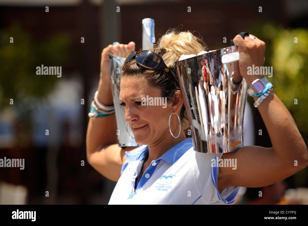 Woman carrying buckets hi-res stock photography and images - Alamy
