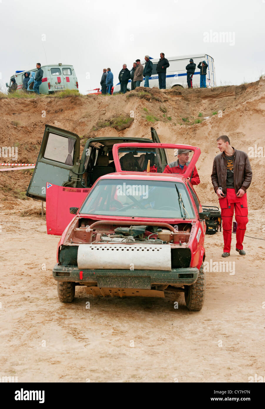 Red racing car in camping Stock Photo - Alamy